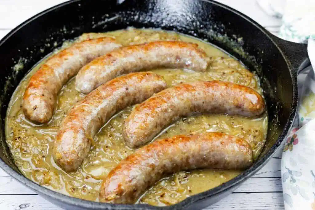 Chef Jenn's Beer Braised Brats with Caramelized Onions - Cook What You Love