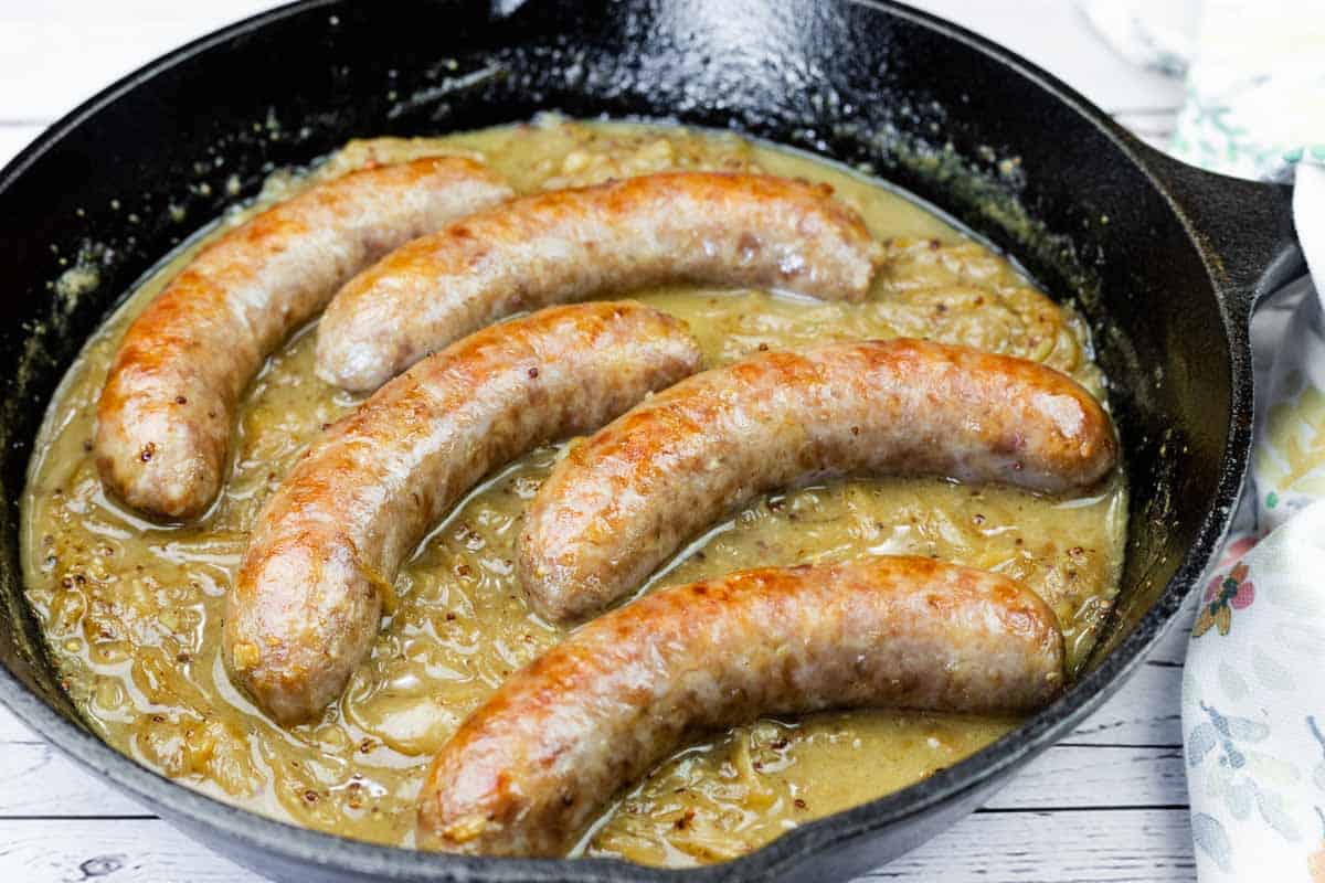 Chef Jenn's Beer Braised Brats with Caramelized Onions - Cook What You Love